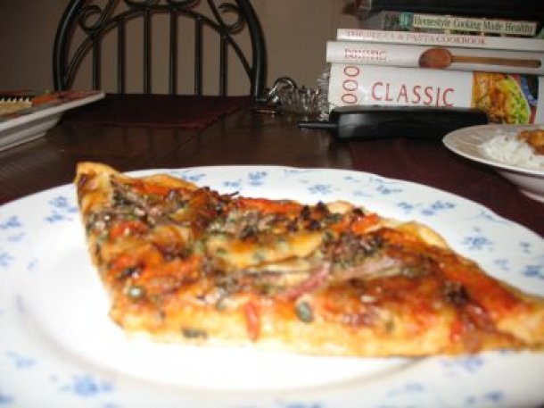 Pizza cu ansoa si ceapa caramelizata | Aperitive | Reteteculinare.RO